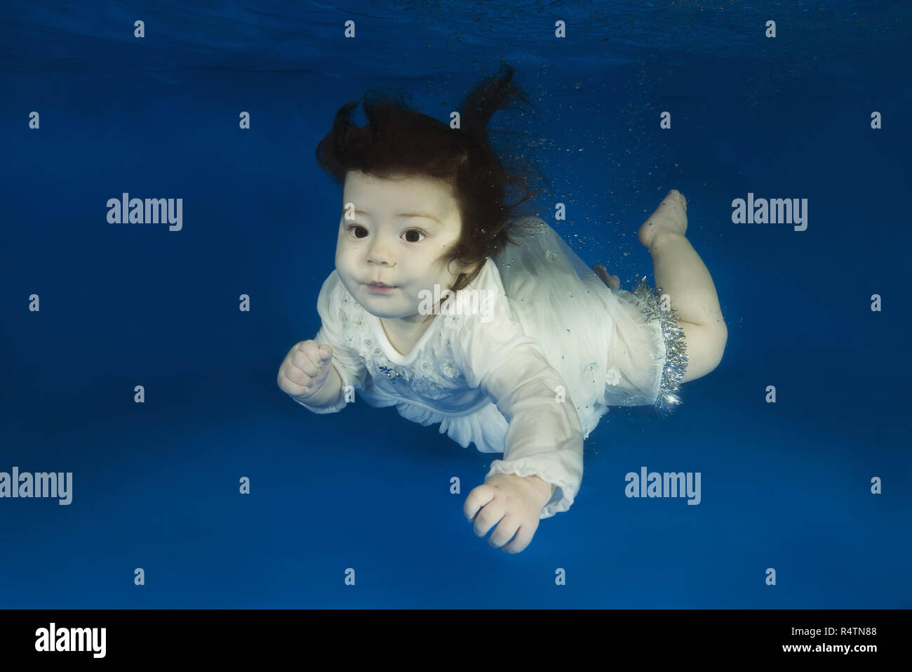Baby swimming underwater hi-res stock photography and images - Alamy
