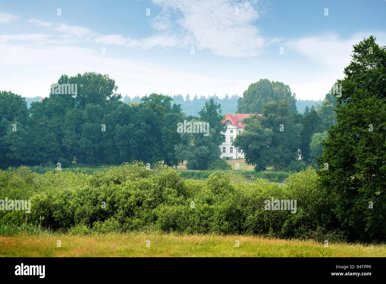 Wedendorf Castle, the former manor house on the lake is today a museum ...