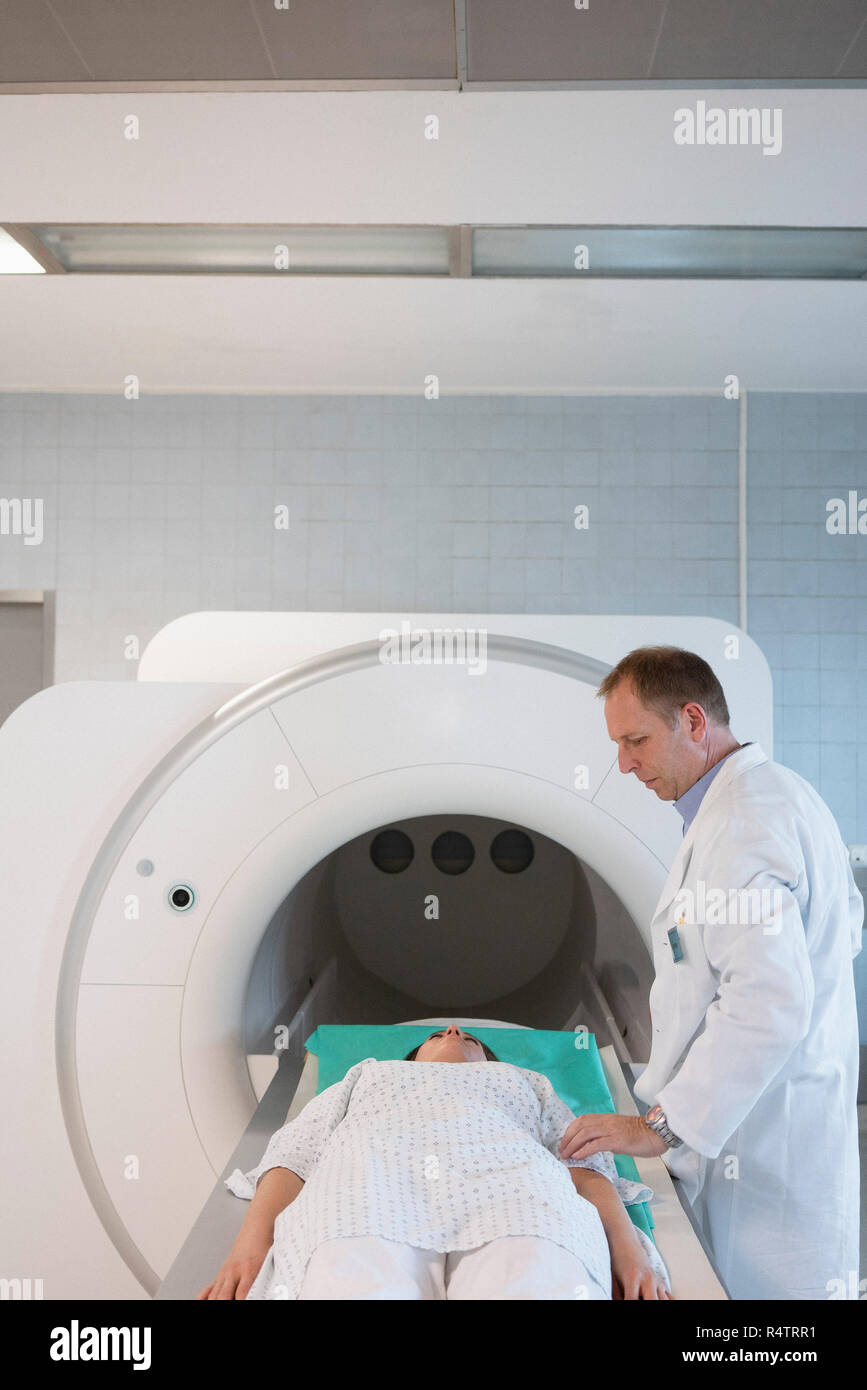 Doctor talking with patient preparing for MRI in hospital Stock Photo ...