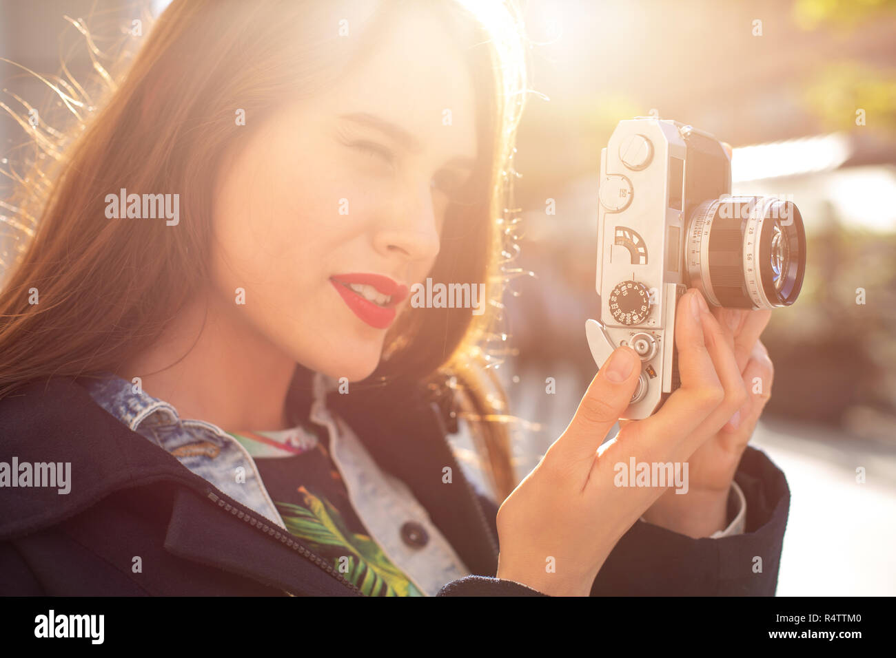 Outdoor autumn smiling lifestyle portrait of pretty young woman, having ...