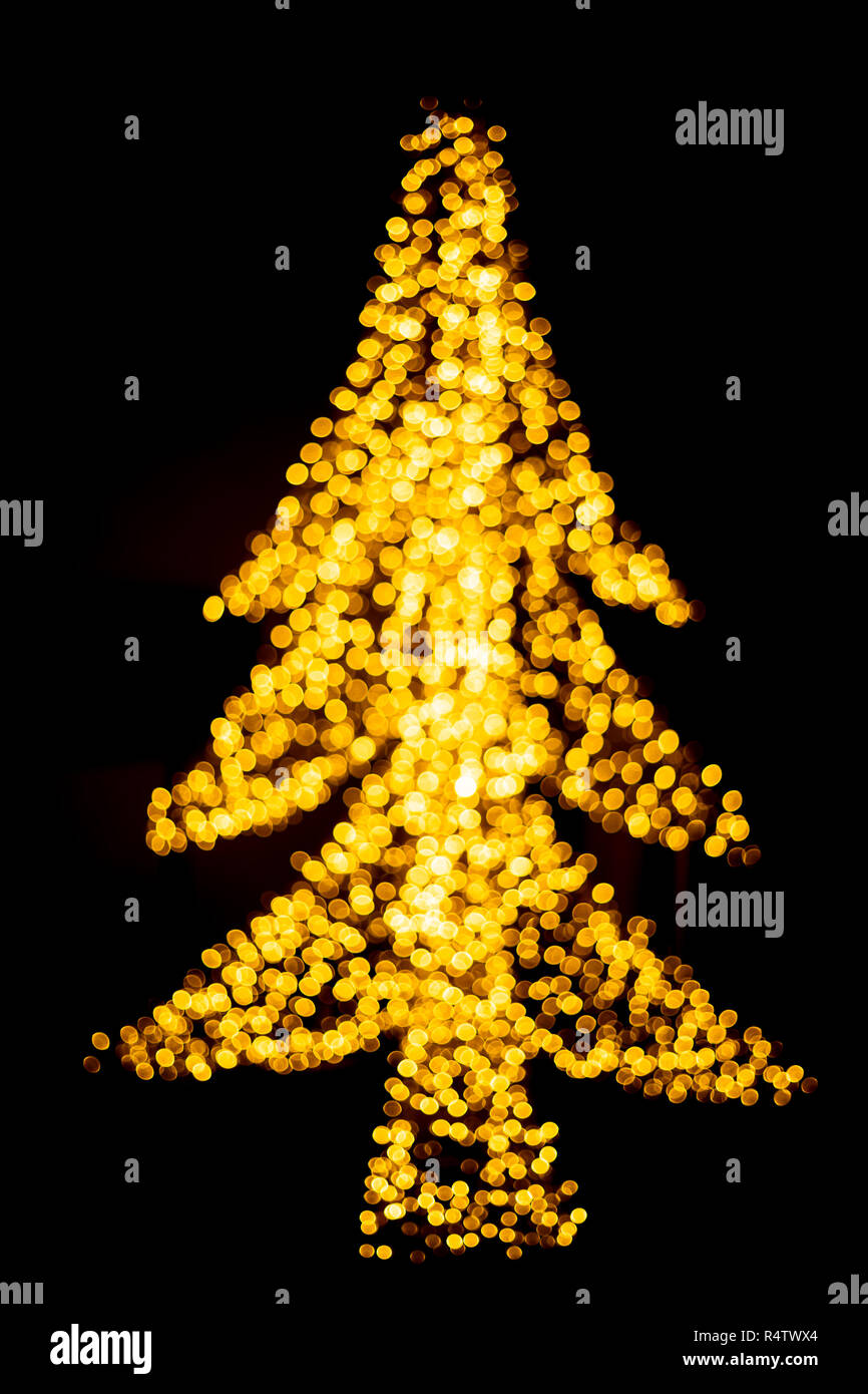 The lights build the outline of a christmas tree Stock Photo - Alamy