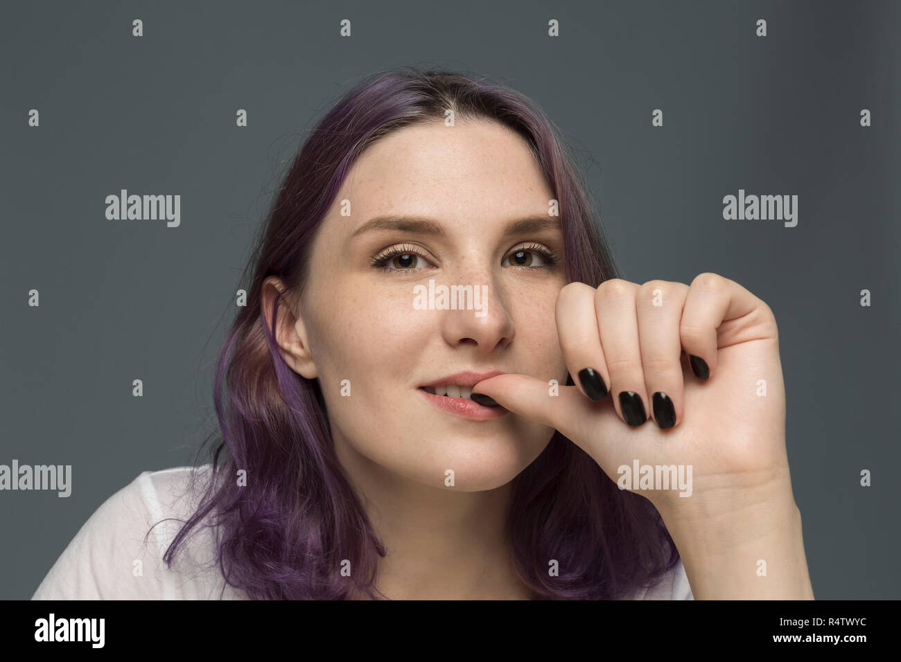 Biting thumb hi-res stock photography and images - Alamy