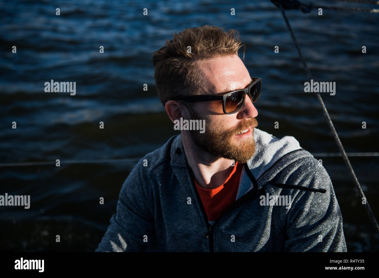 Man driving small boat hi-res stock photography and images - Alamy