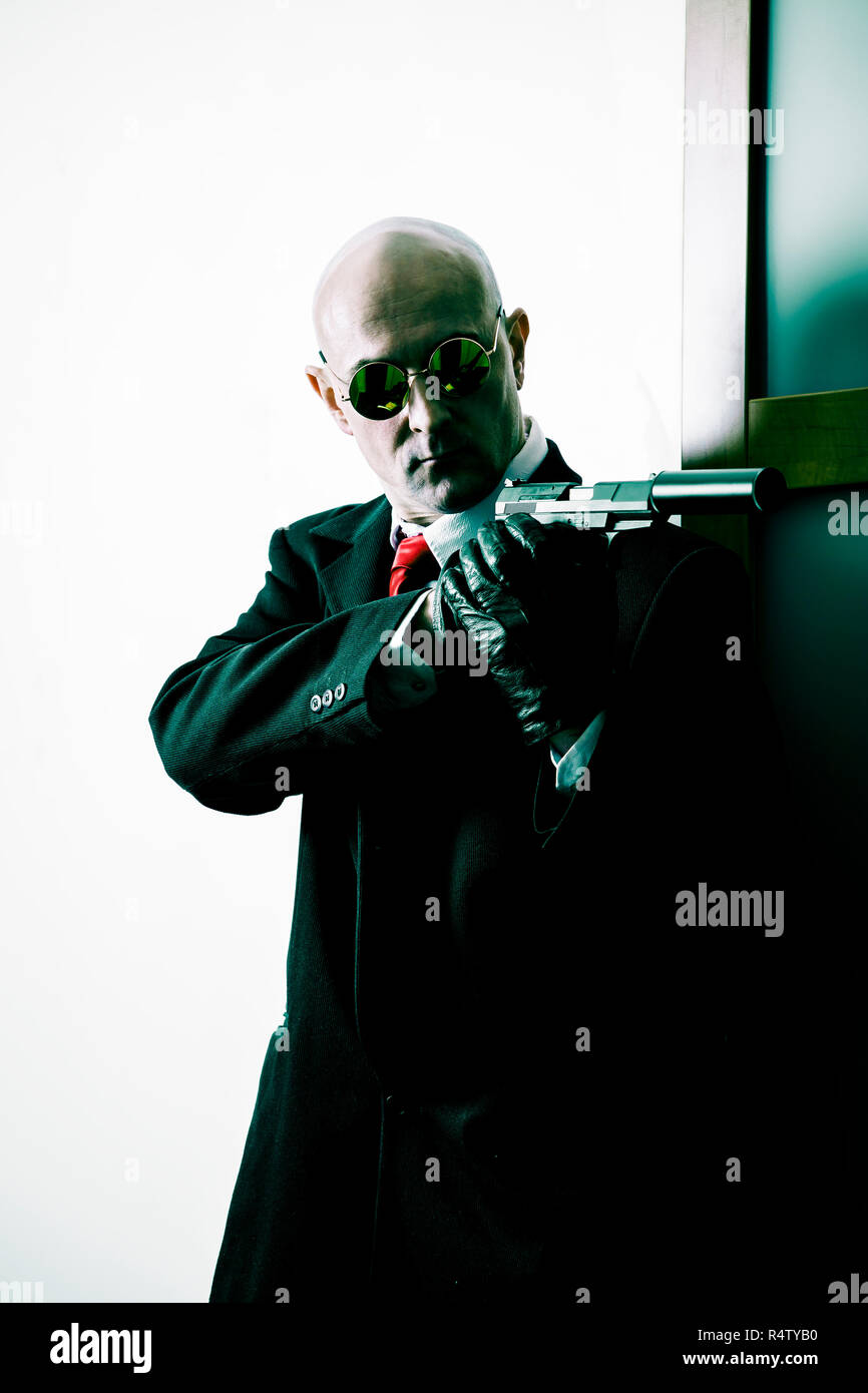 Spy gun hi-res stock photography and images - Alamy
