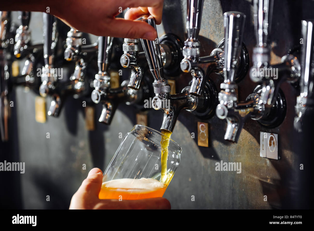 Pouring taps hi-res stock photography and images - Alamy