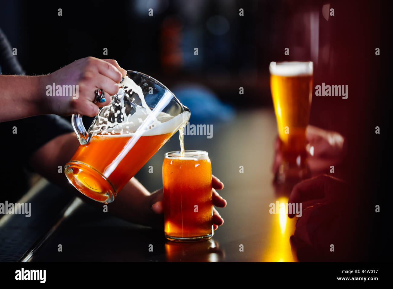 Pouring from pitcher beer hi-res stock photography and images - Alamy