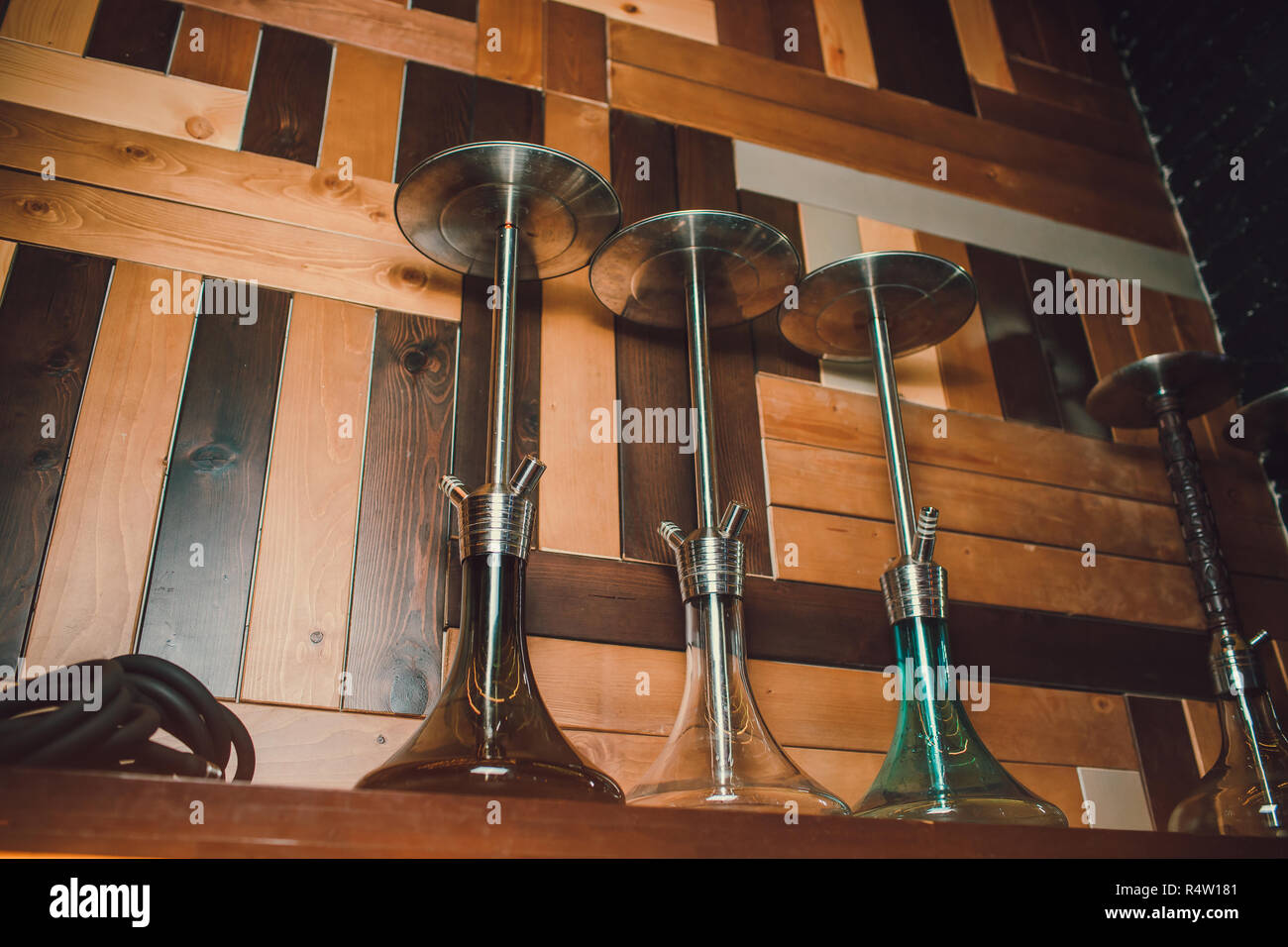 Wood hookah on table in hookah lounge Stock Photo - Alamy