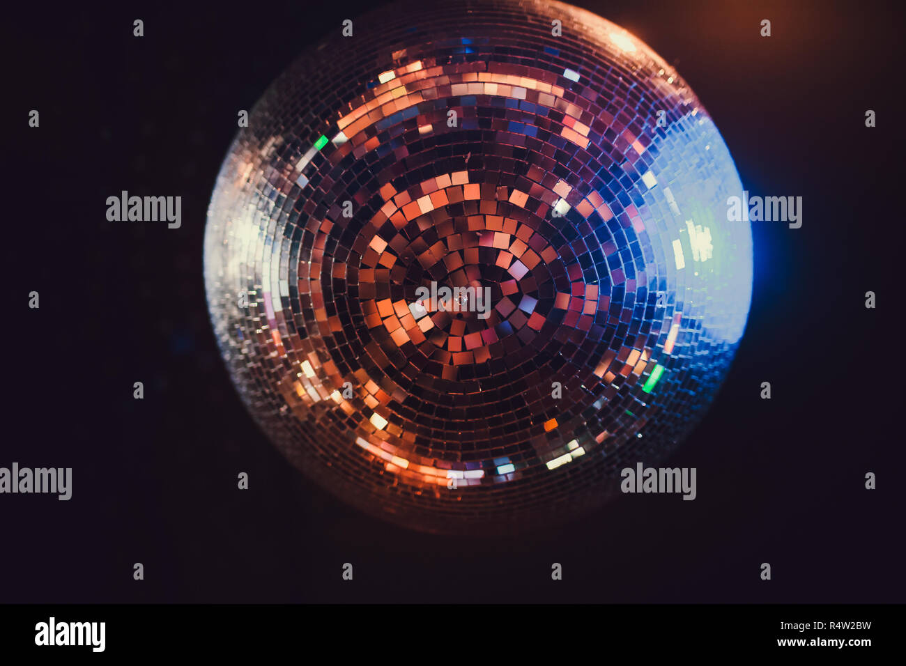 Disco ball with bright rays, night party background photo Stock Photo ...