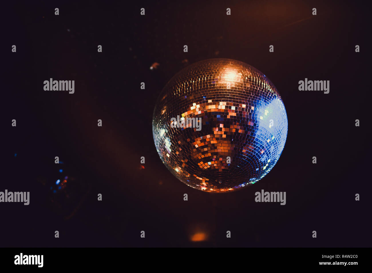 Disco ball with bright rays, night party background photo Stock Photo ...