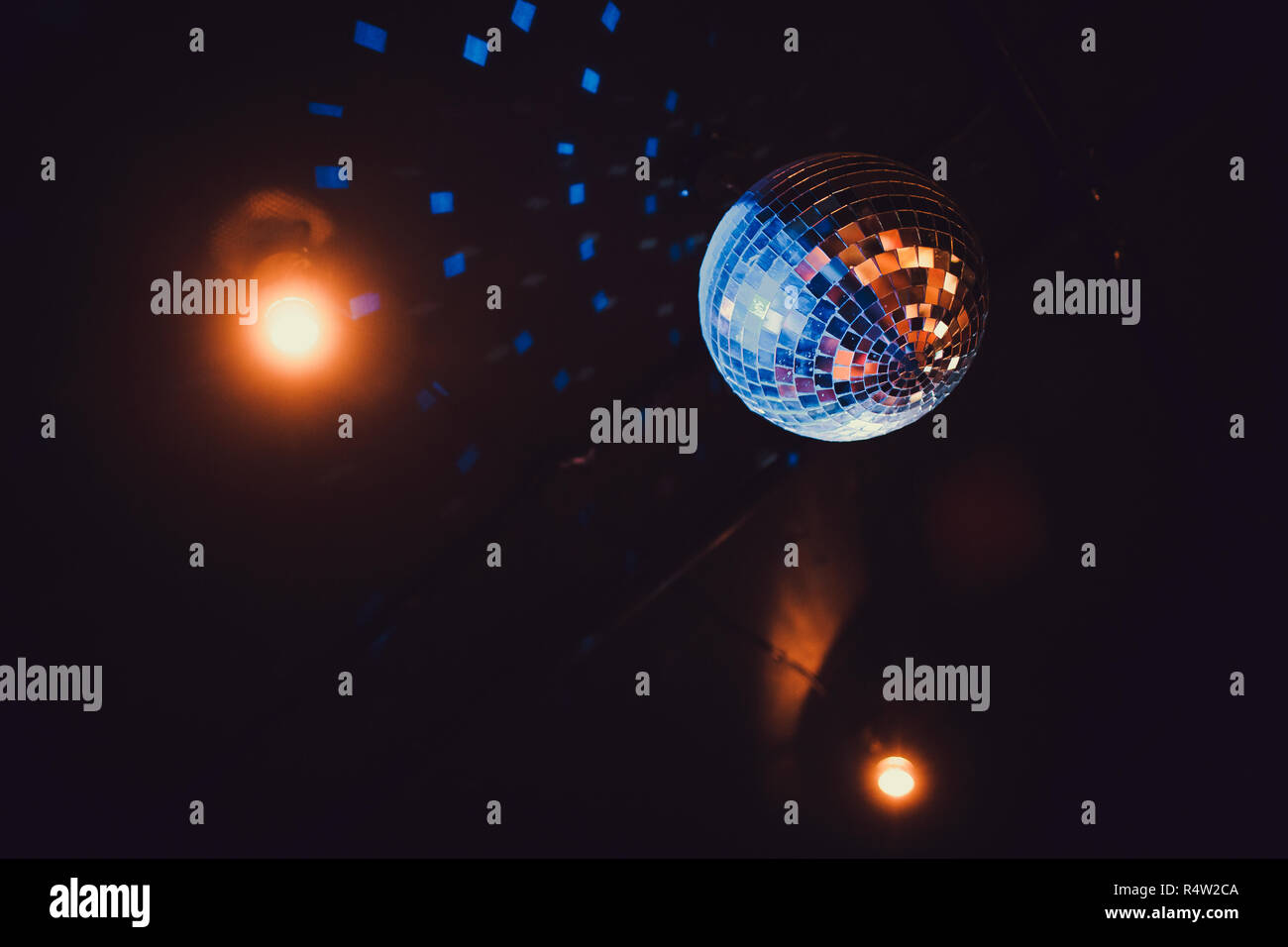Disco ball with bright rays, night party background photo Stock Photo ...