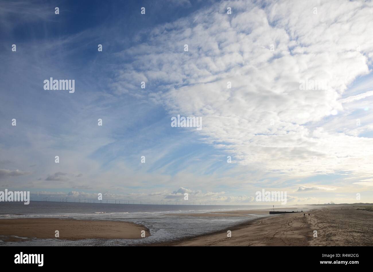 Empty seascape with big open sky, clouds and wind turbines on the ...