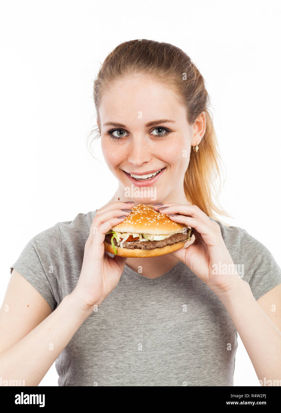 Girl with a burger Stock Photo - Alamy