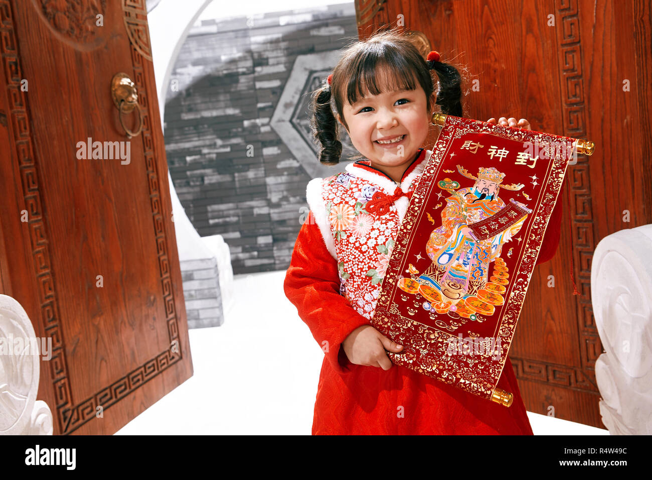 Lovely little girl celebrating the New Year Stock Photo - Alamy