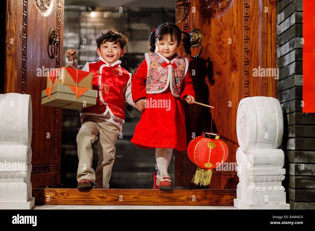 Happy boys and girls to celebrate the New Year Stock Photo - Alamy