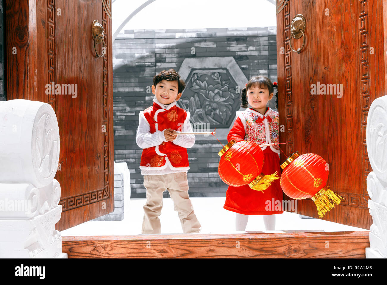 Happy boys and girls to celebrate the New Year Stock Photo - Alamy