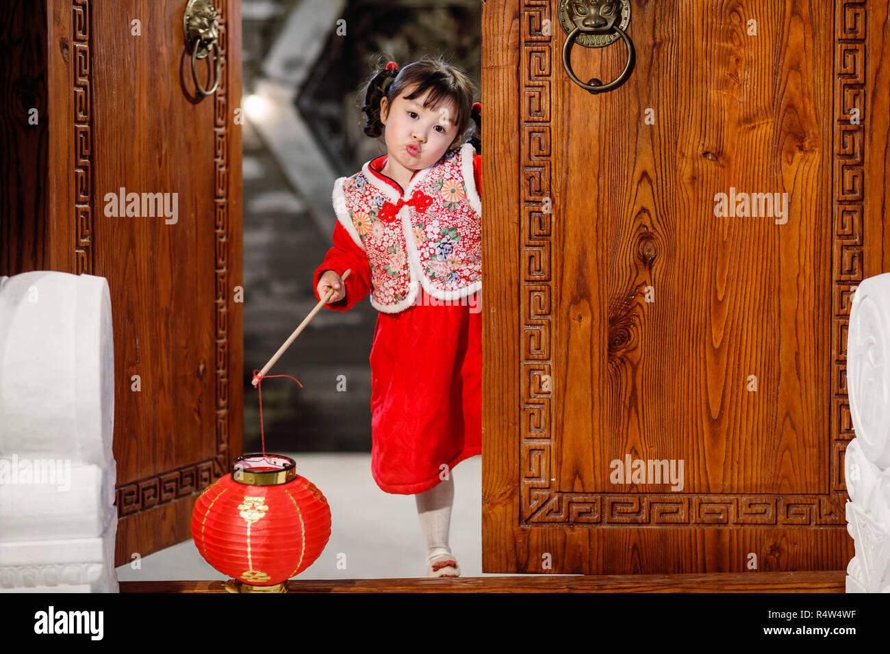 Happy little girl celebrating the New Year Stock Photo - Alamy