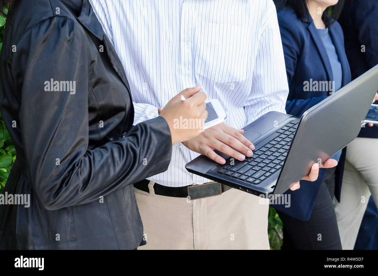 Close up man hand using computer laptop with teams Stock Photo - Alamy