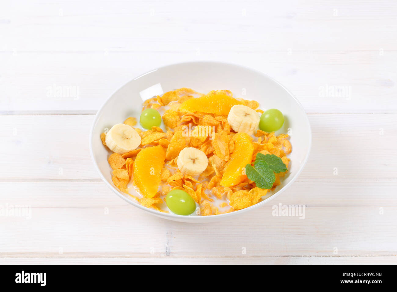 corn flakes with milk and fresh fruit Stock Photo - Alamy