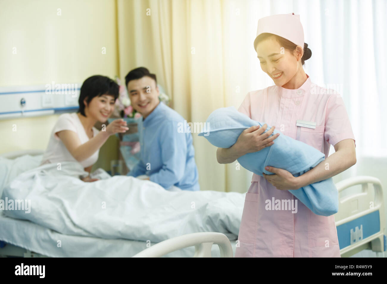 Nurses and parents of the newborn Stock Photo - Alamy