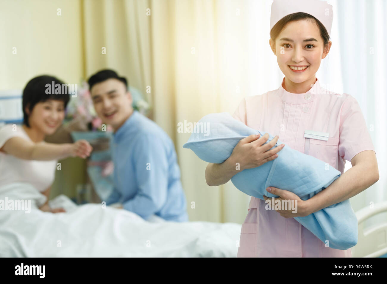 Nurses and parents of the newborn Stock Photo - Alamy