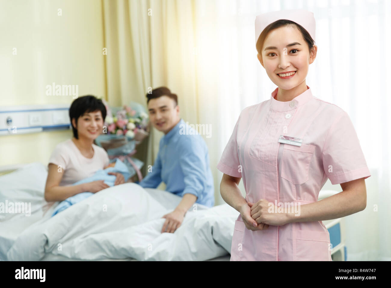 Nurses and parents of the newborn Stock Photo - Alamy