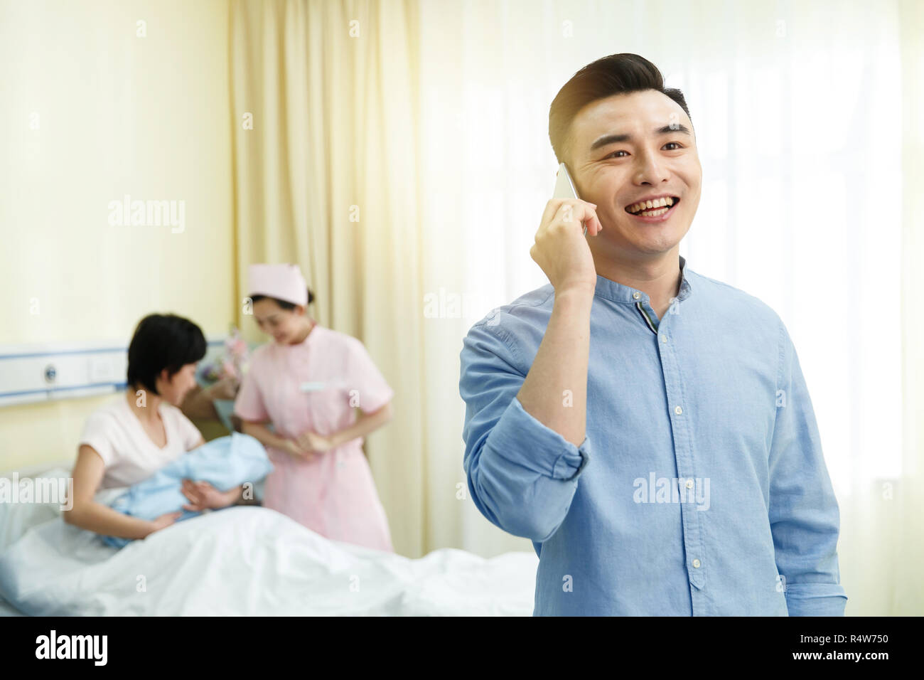 Nurses and parents of the newborn Stock Photo - Alamy