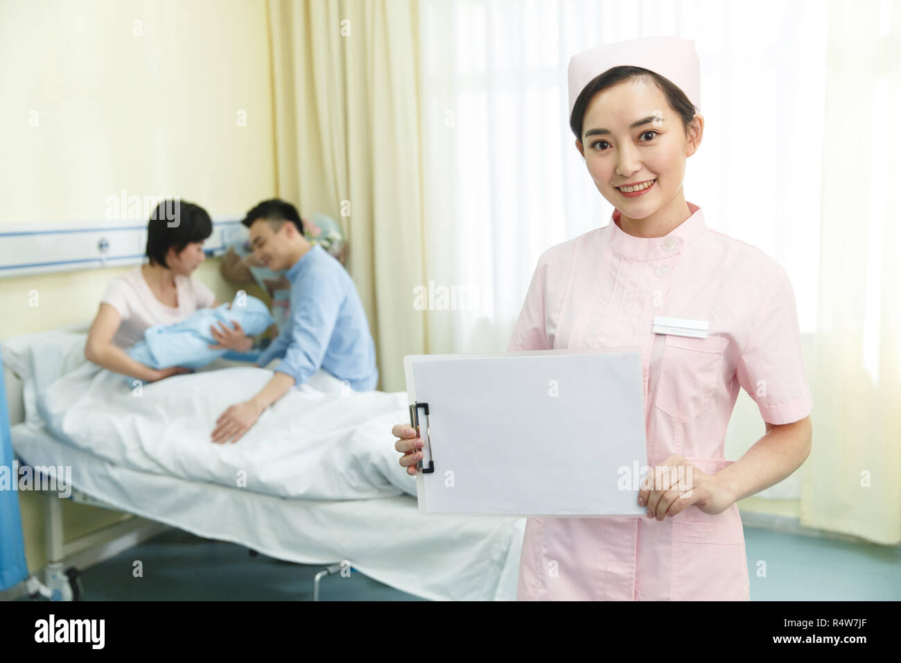 Nurses and parents of the newborn Stock Photo - Alamy