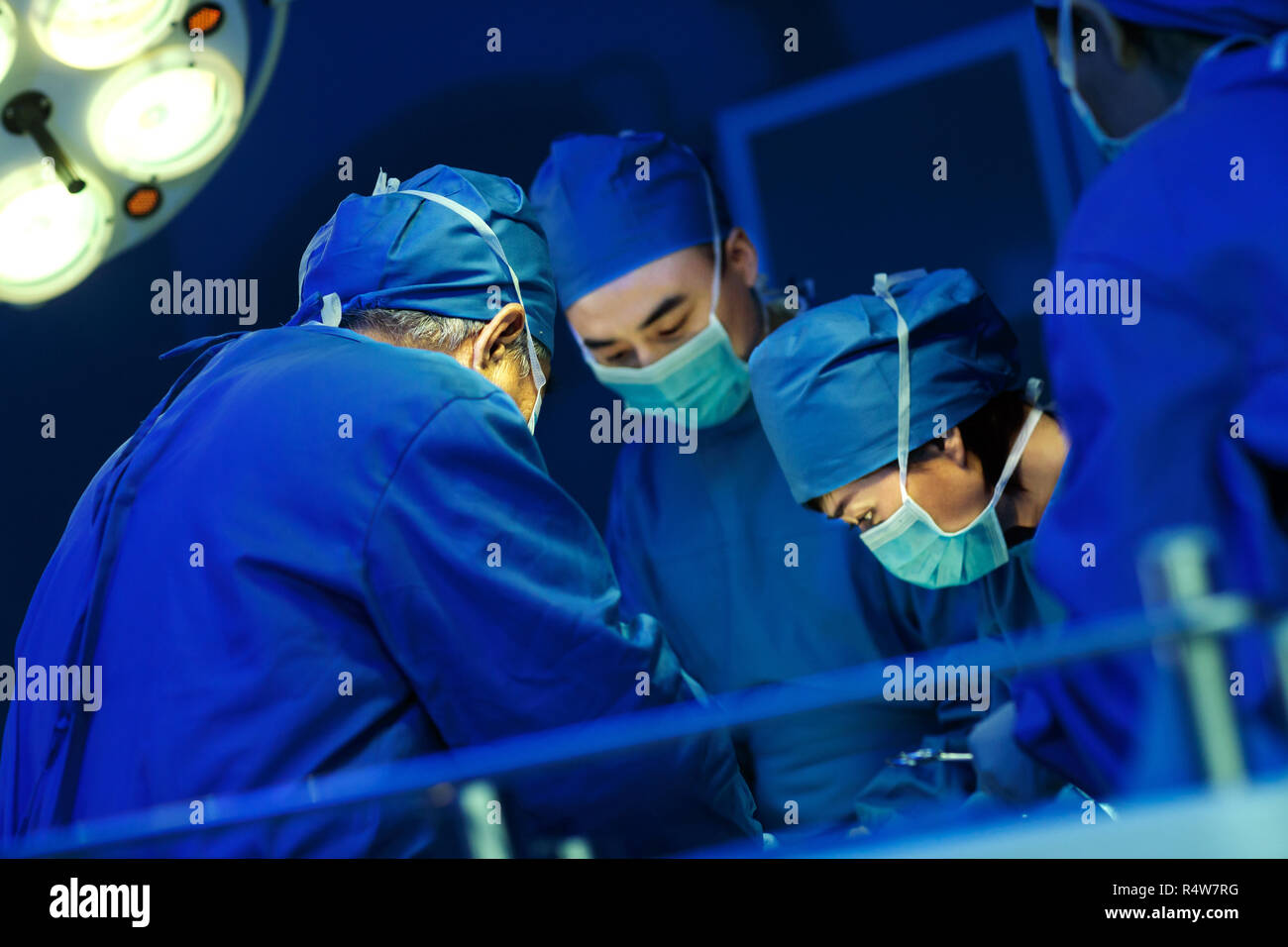 Medical workers in operation Stock Photo - Alamy