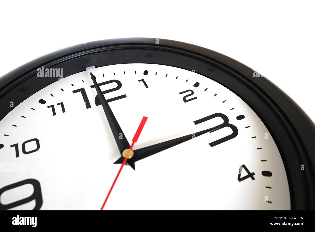 Fragment of big round wall clock with a black rim isolated on white ...