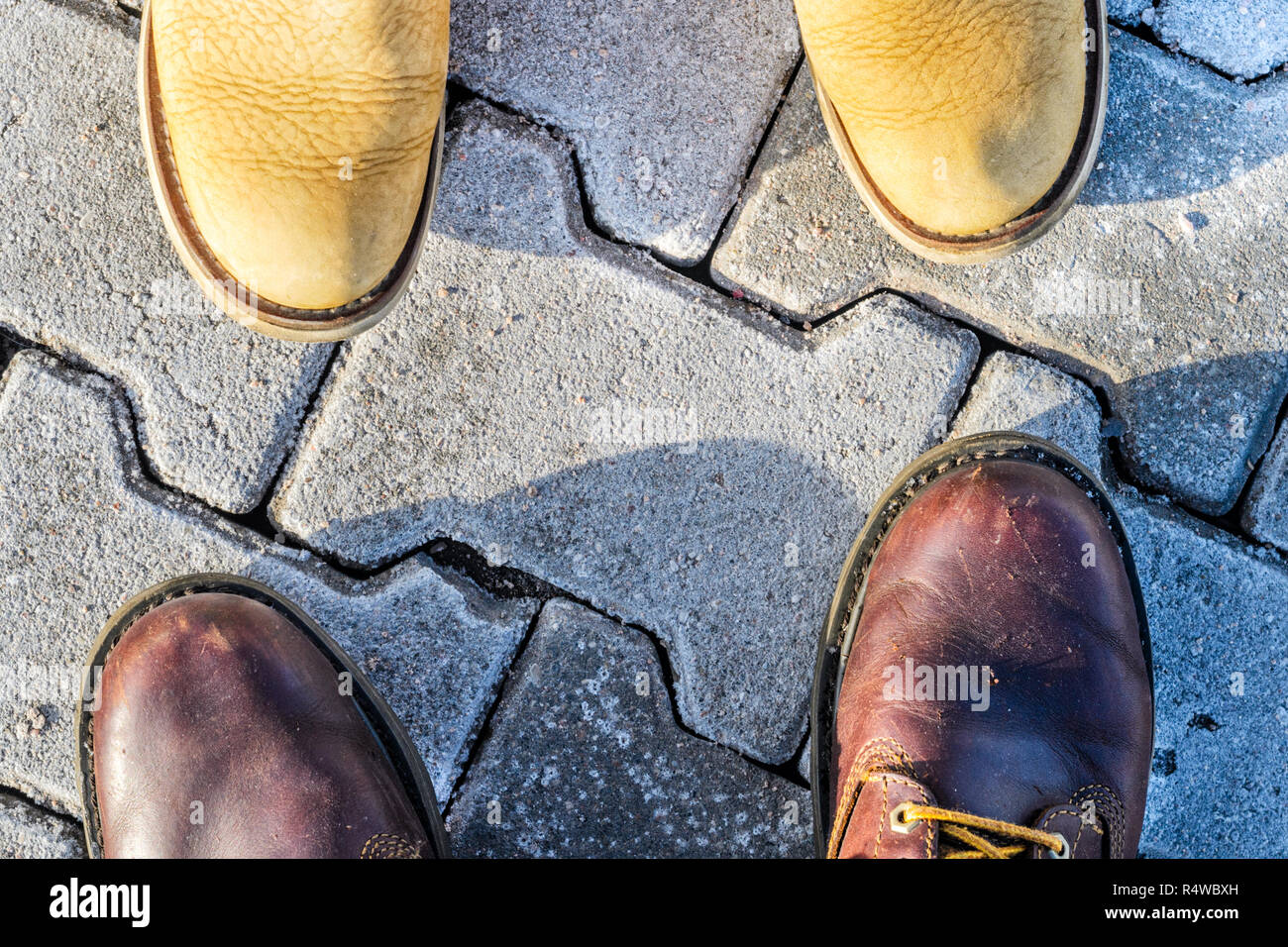 First person view of shoes. Couple on winter walk-concept. View from ...