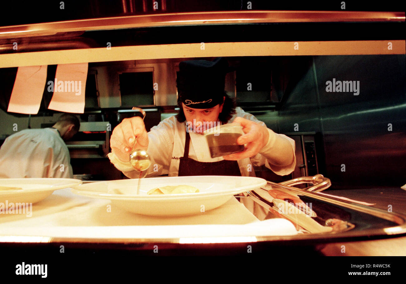 26 JUNE 1998 - Restaurant owner and Chef Michael Deane puts a finishing ...