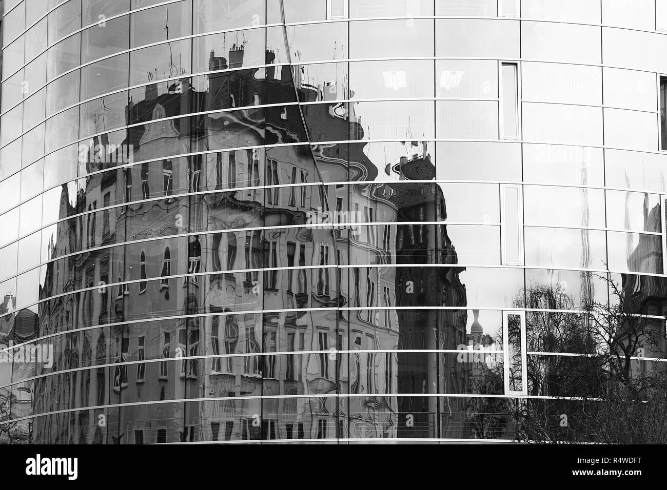 Like in a magical mirror, an historic building of Prague deformed by ...