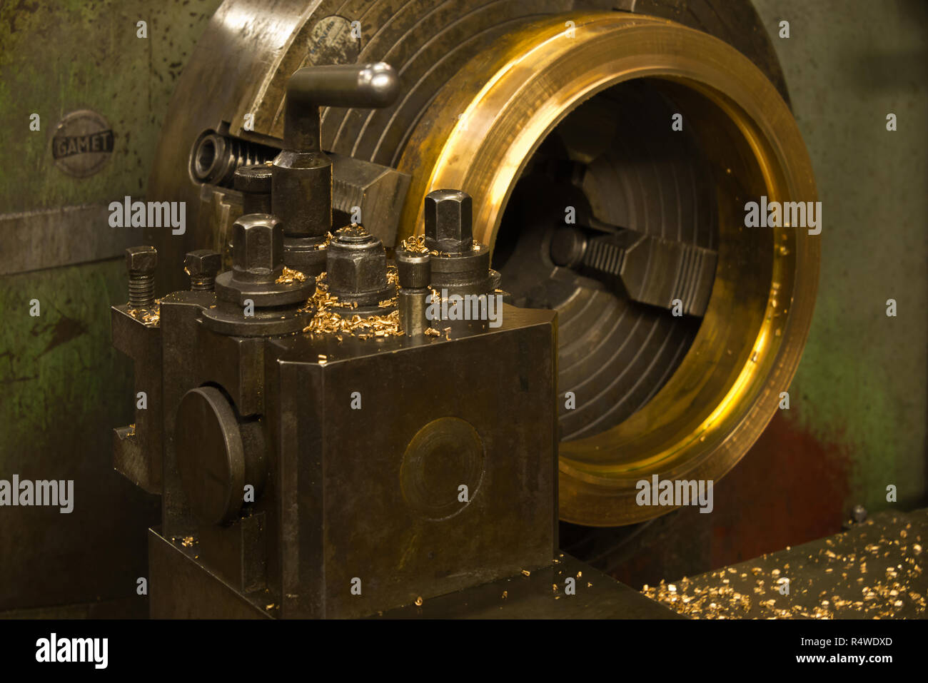 A brass fitting being turned on a lathe in the Engine Sheds at Minehead ...