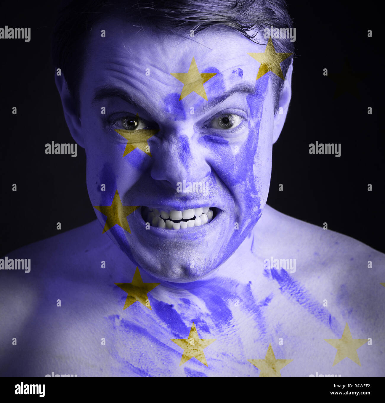 Portrait of man with European Union Flag on his face. Conceptual image ...