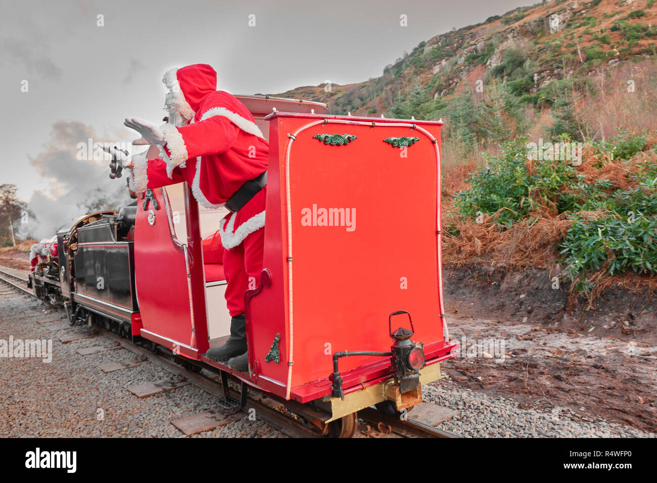 Santa Claus, Father Christmas, waves goodbye as he leaves by train on ...