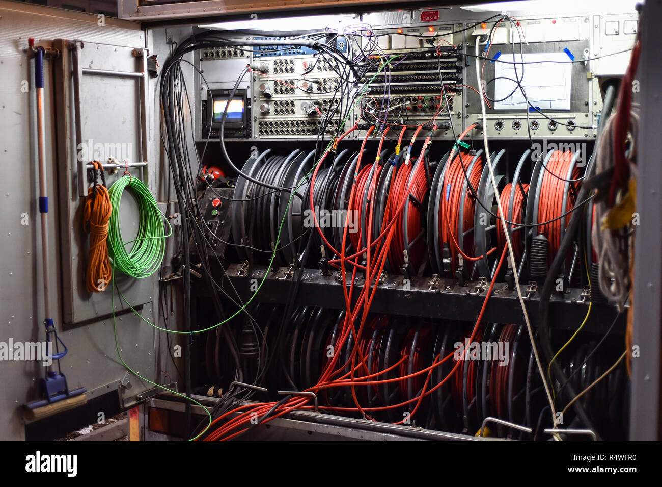 Cables and control panel detail from a television broadcasting truck ...