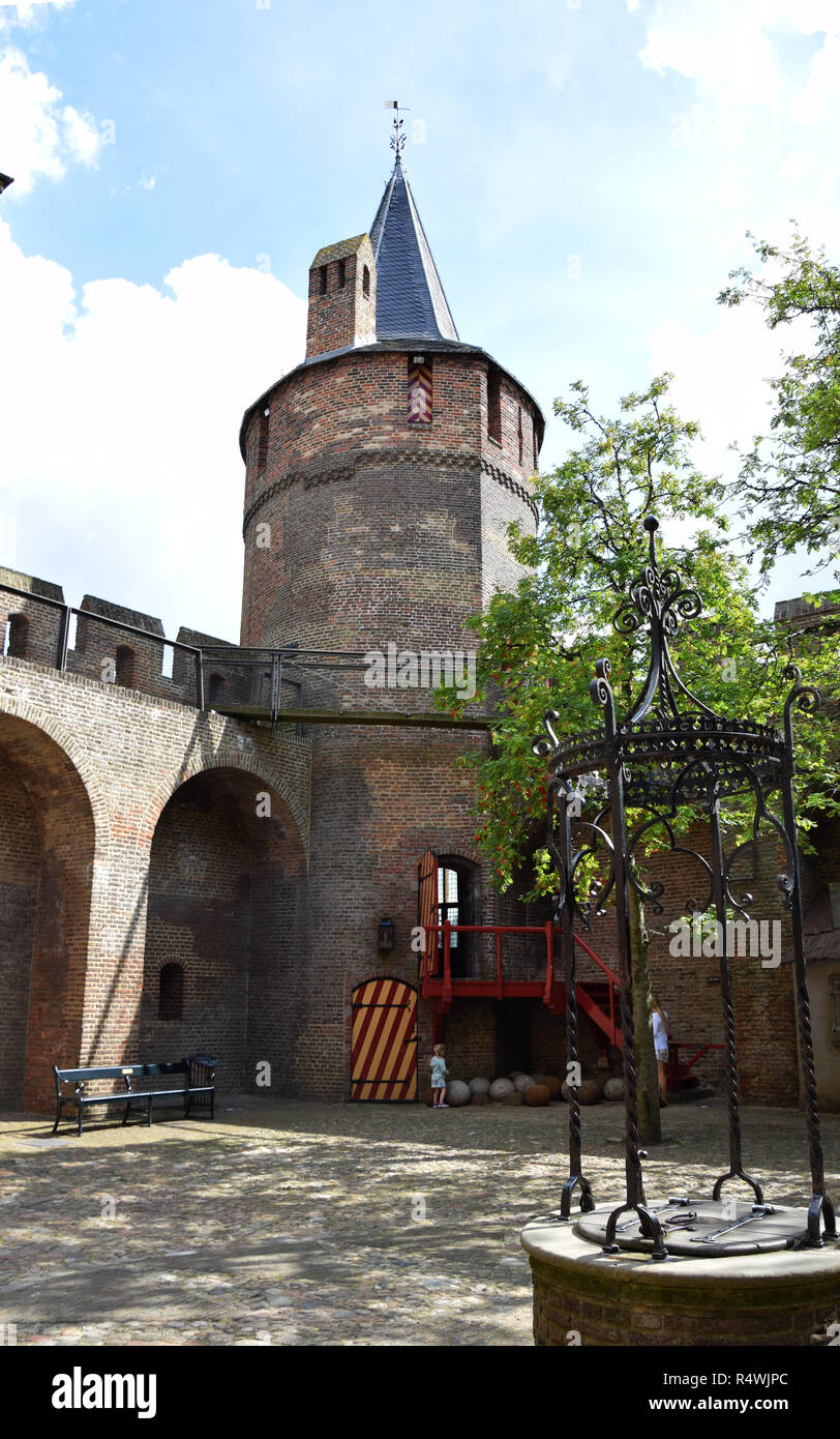 Courtyard with view on one of the castle towers of Muiderslot, Muiden ...