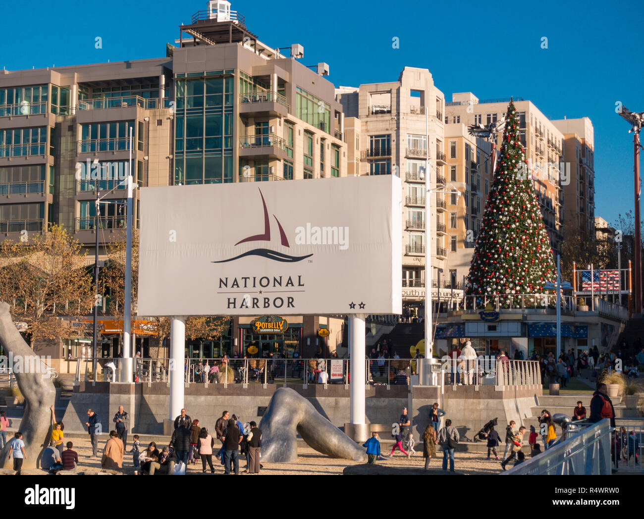 NATIONAL HARBOR, MARYLAND, USA - People on beach and sign Stock Photo ...