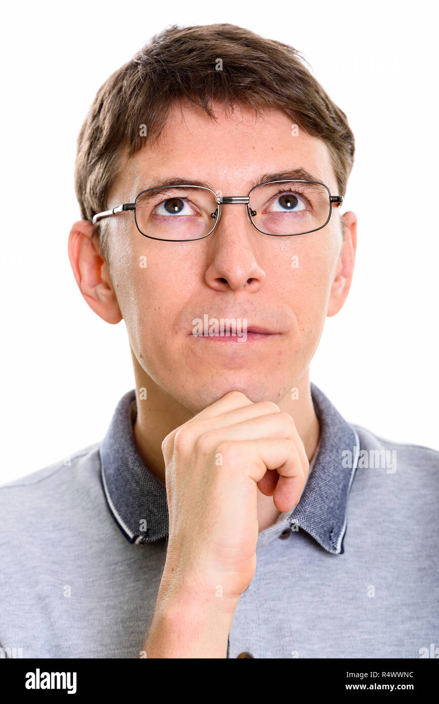 Studio shot of face of man thinking Stock Photo - Alamy