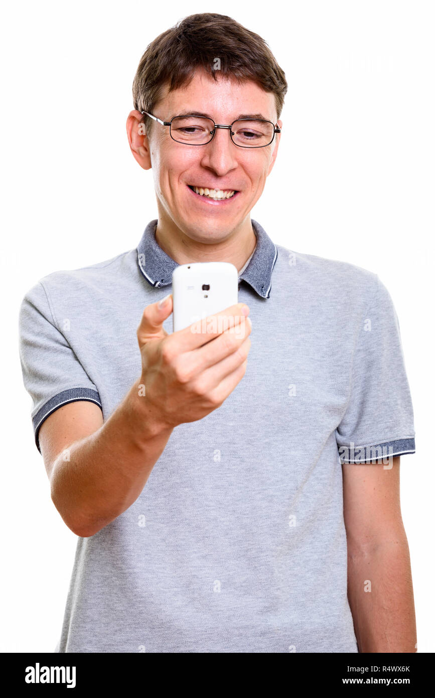 Happy man holding phone hi-res stock photography and images - Alamy