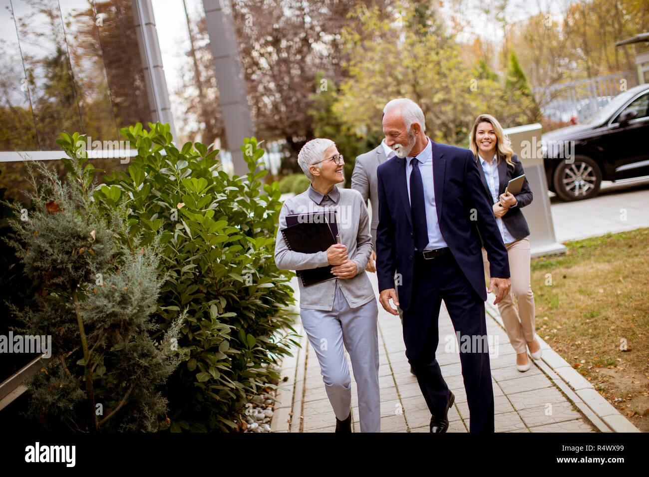 Office worker walking outdoors hi-res stock photography and images - Alamy