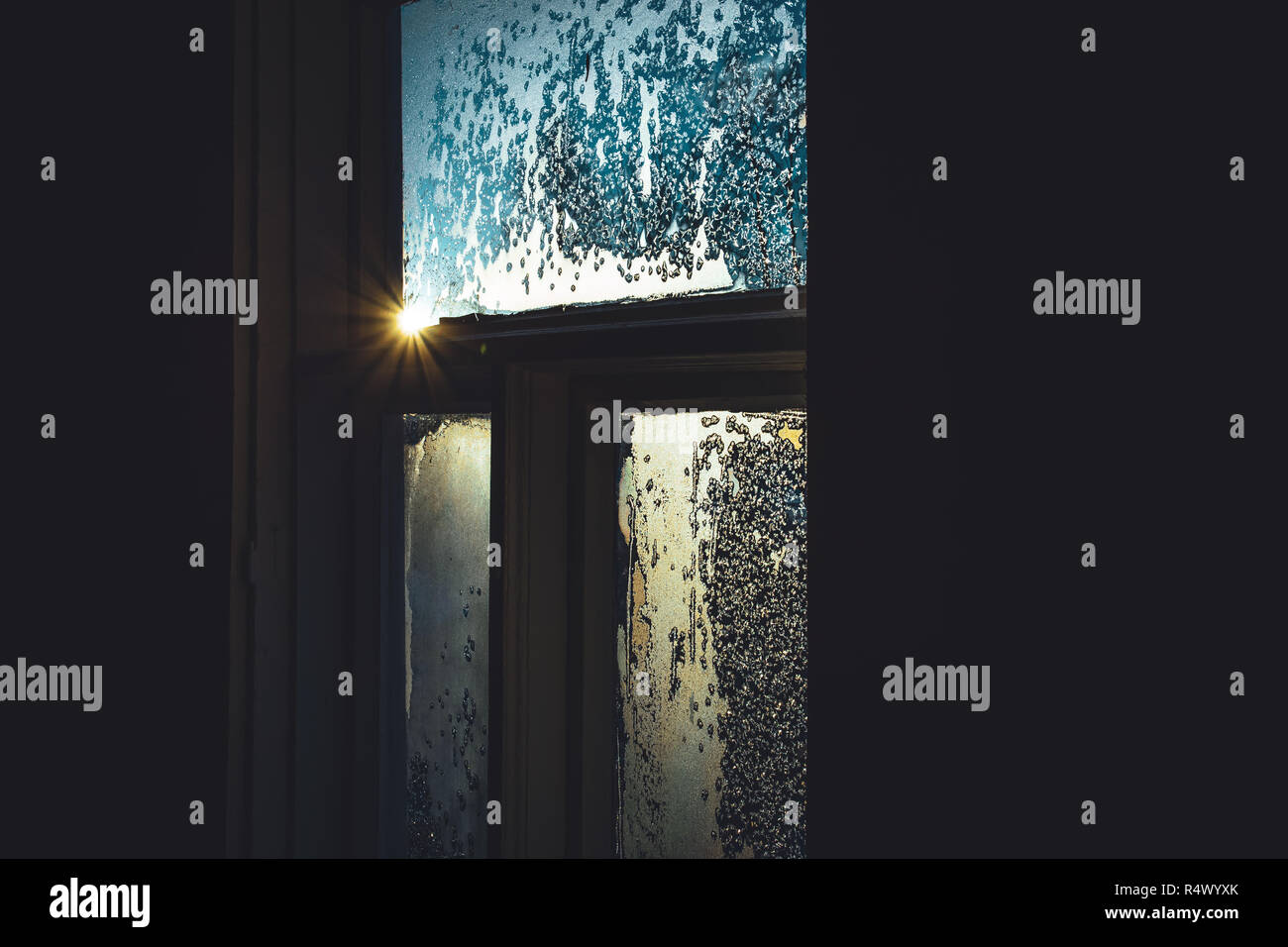 Old window with mystical light Stock Photo - Alamy