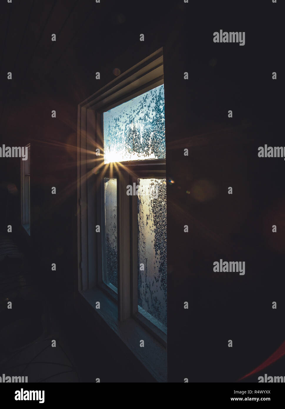 Old window with mystical light Stock Photo - Alamy