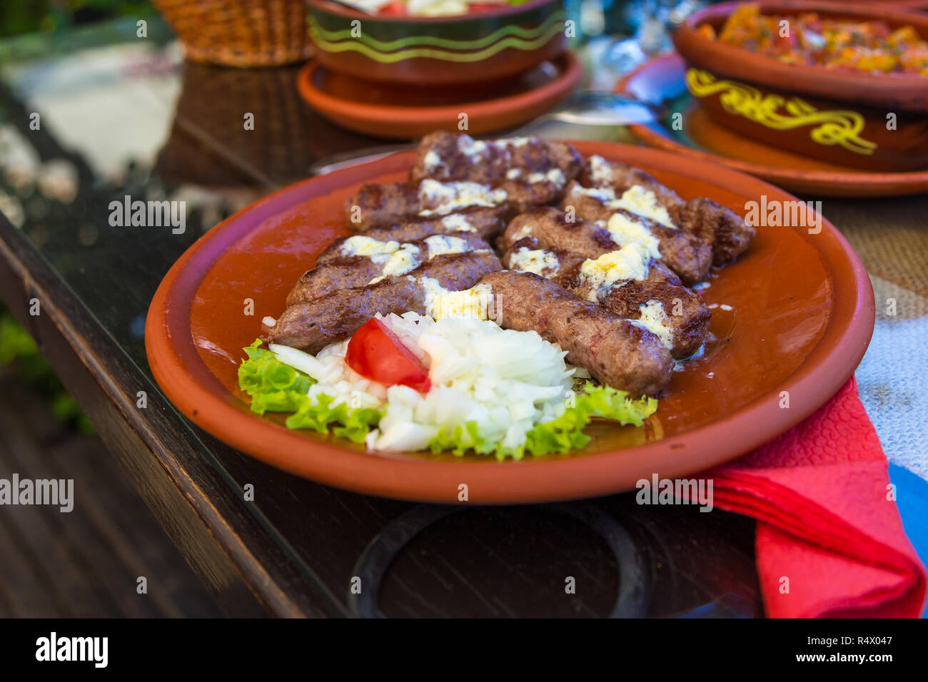 Cevapcici, a small skinless sausage cooked on the barbecue. Zlatibor ...