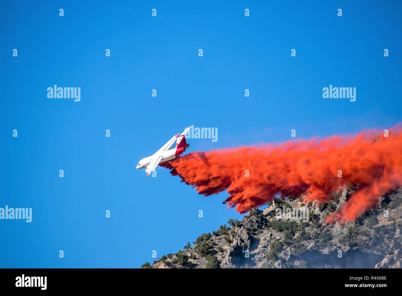 Slurry bombers (planes and jets) fight wildfires from the air by ...