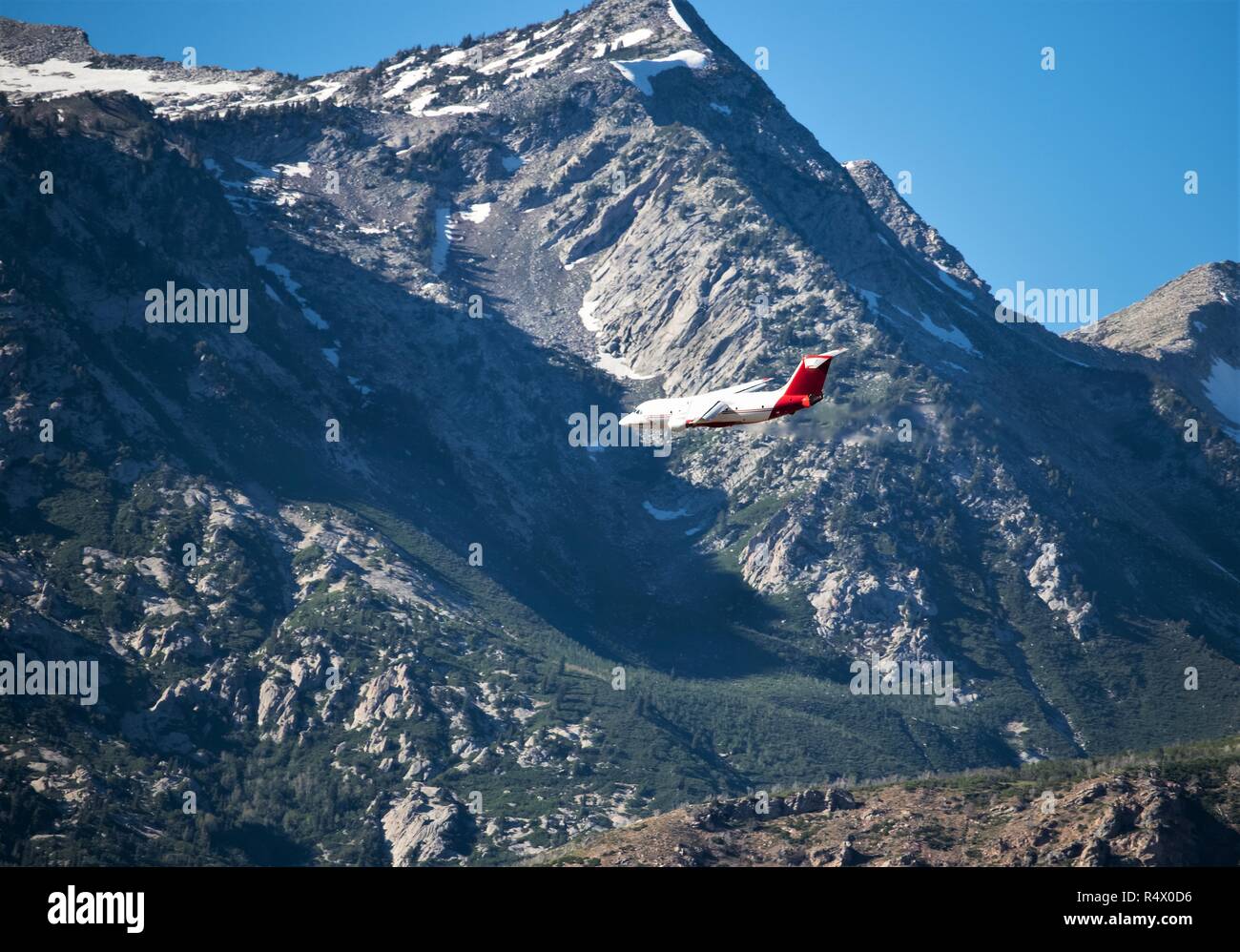 Slurry bombers (planes and jets) fight wildfires from the air by ...
