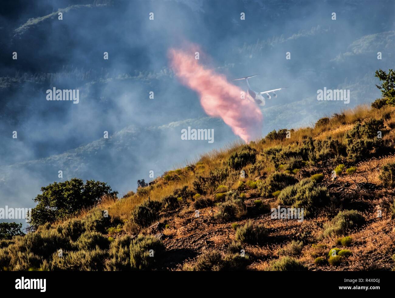Slurry bombers (planes and jets) fight wildfires from the air by ...
