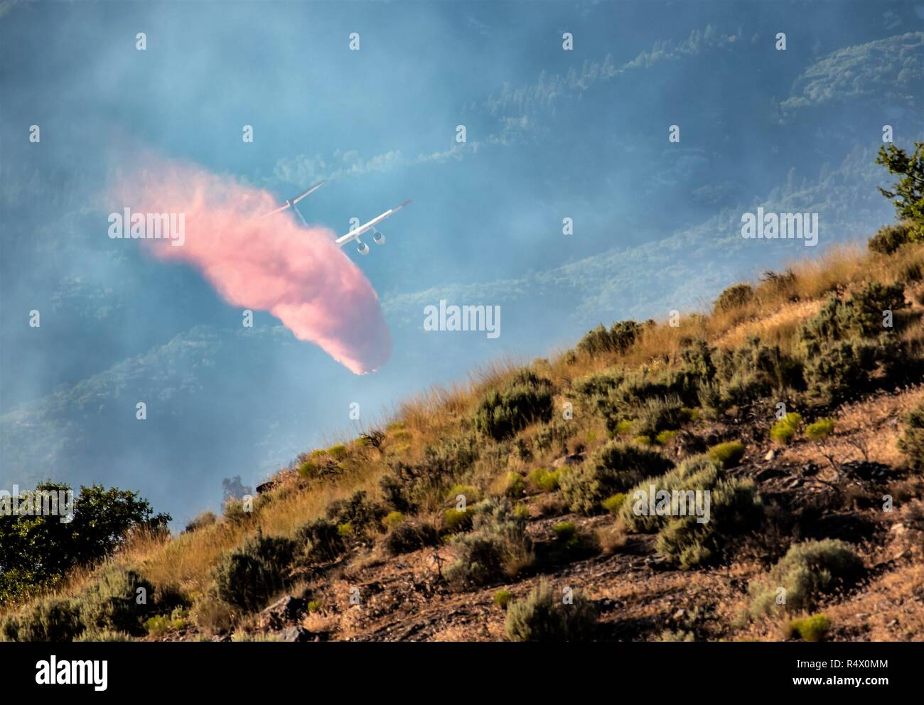 Slurry bombers (planes and jets) fight wildfires from the air by ...