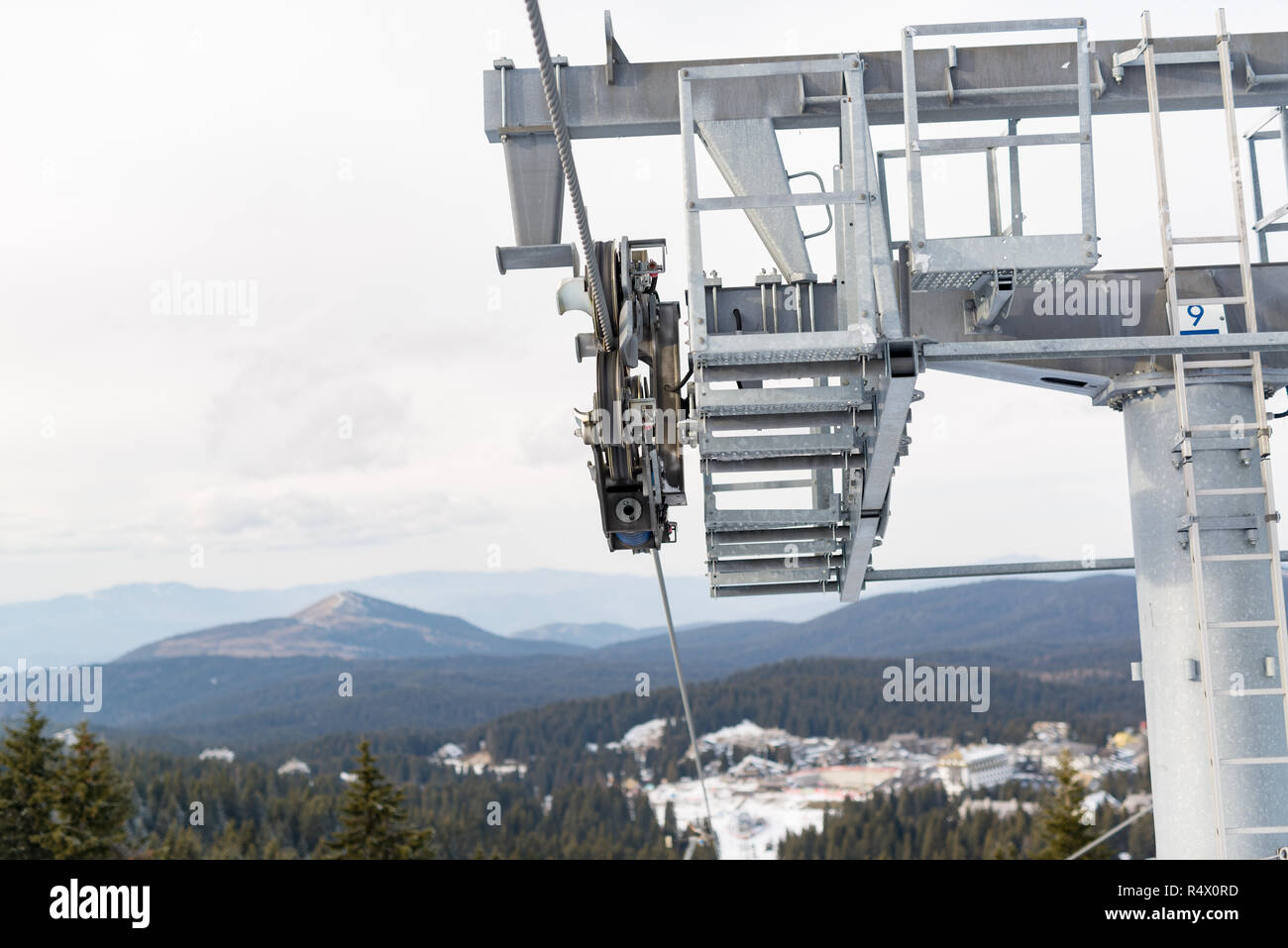 Top of a cable car lift at a ski resort Stock Photo - Alamy