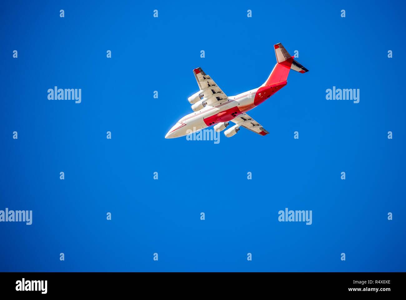 Slurry bombers (planes and jets) fight wildfires from the air by ...